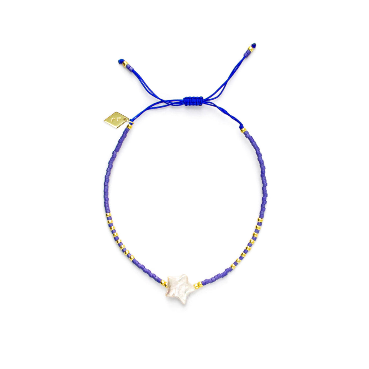 Wobbly Star Wristlet, Blue – Rare Rabbit