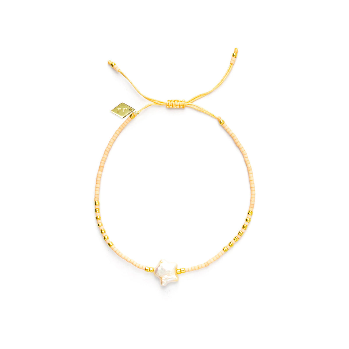 Wobbly Star Wristlet, Peach – Rare Rabbit